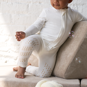 First-of-its-kind infant crawling support onesie – Grip Baby