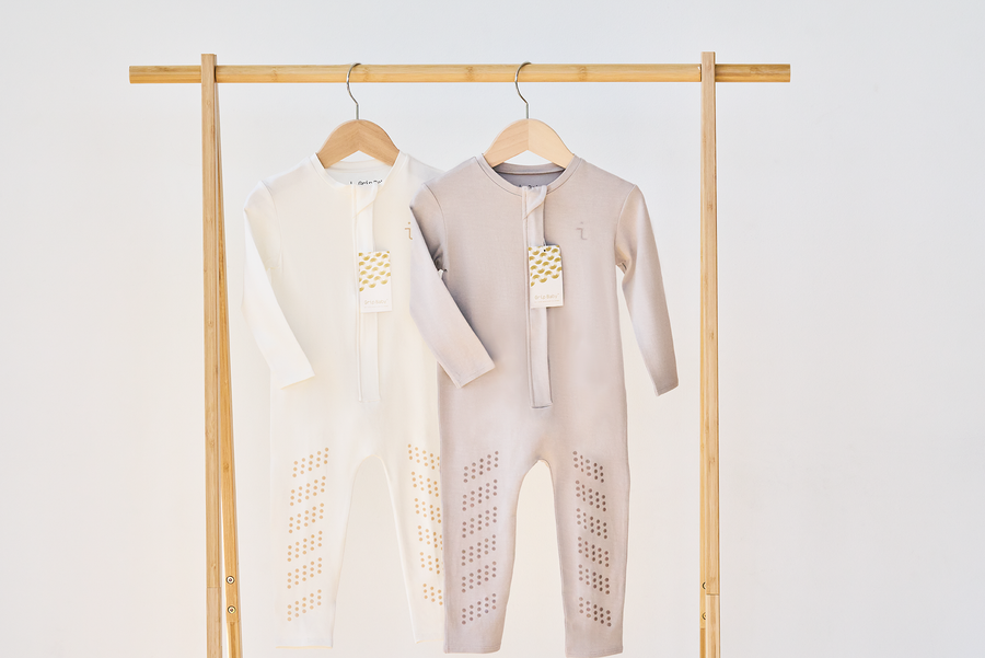 First-of-its-kind infant crawling support onesie – Grip Baby